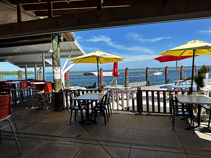 Paradise defined: cold drinks, fresh seafood, and a water view where boats drift by as if they're part of the entertainment package.