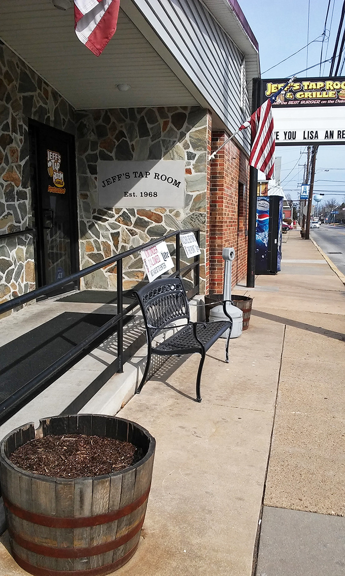 A slice of Americana with stone facade and American flag. That bench outside isn't just seating&mdash;it's where you'll contemplate your next visit.