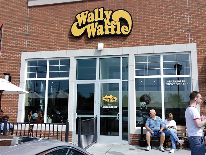 The outdoor bench: where satisfied customers contemplate their life choices and plan their next waffle conquest.