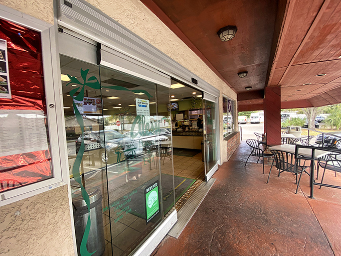 The outdoor seating area&mdash;where pastry-laden conversations happen and Tampa's weather actually works in your favor.