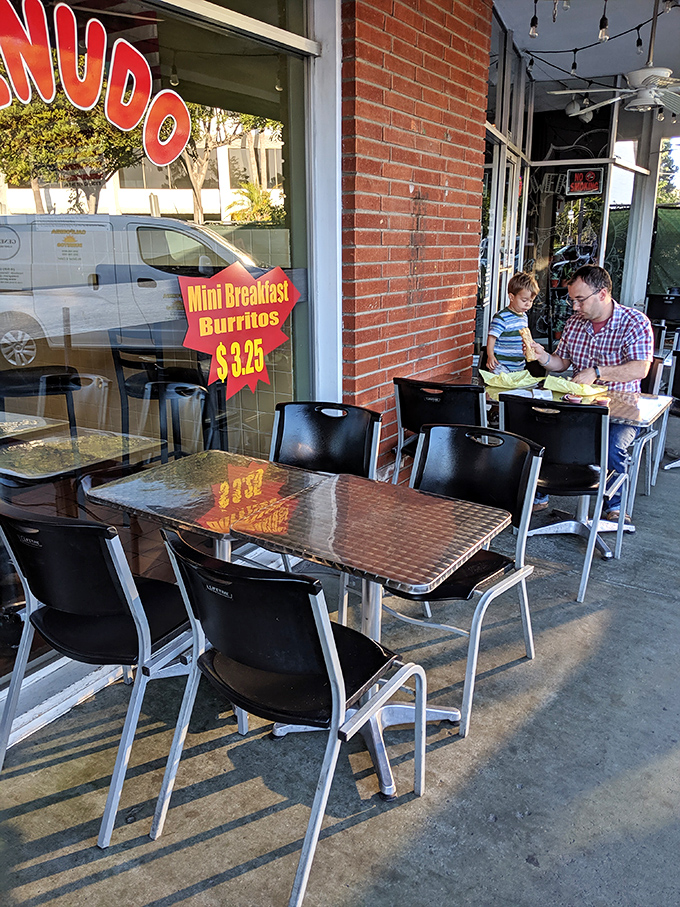 Sidewalk dining where burrito memories are made. These outdoor tables have witnessed countless "first bite" expressions of pure joy.
