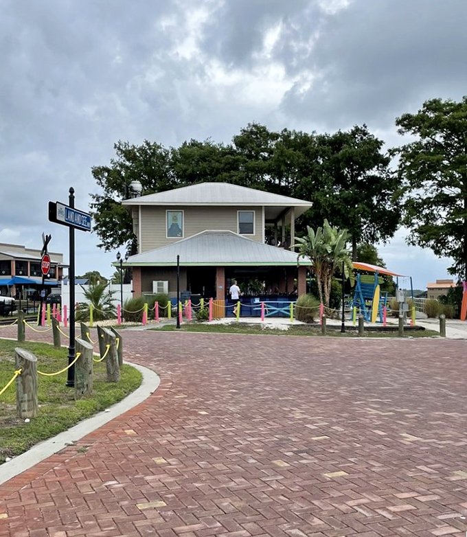 The brick pathway leading to Kalua Beach Bar feels like following the yellow brick road, except with fish and chips waiting at the end.
