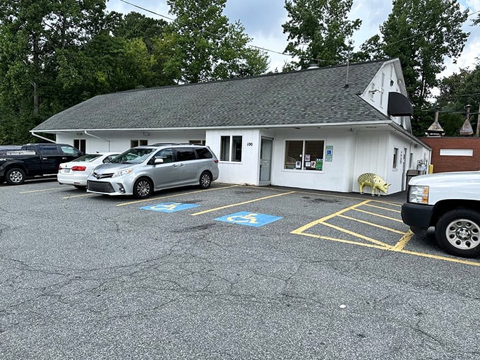 The parking lot tells the story&mdash;local plates mixed with out-of-state visitors who've made the pilgrimage to one of North Carolina's barbecue holy sites.