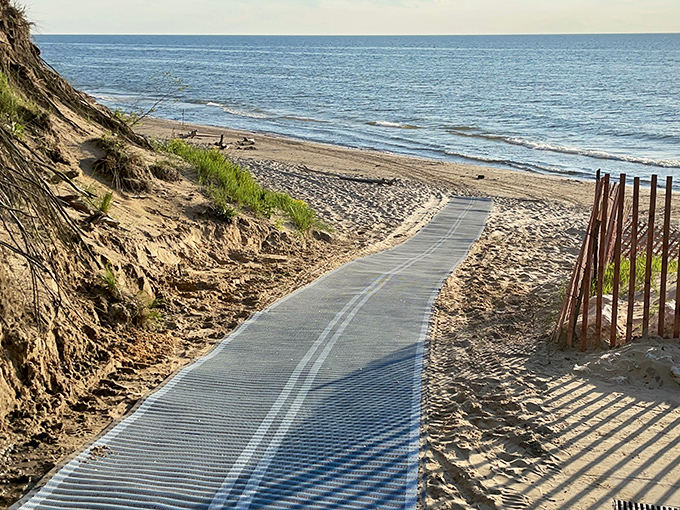 The boardwalk beckons with a promise: follow me to where the horizon stretches forever and everyday worries can't follow.