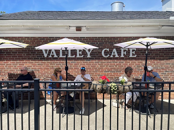 Valley Caf&eacute;'s patio: where breakfast meets fresh air and nobody judges you for wearing sunglasses to hide your pre-caffeine eyes.