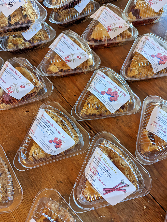 The pie lineup resembles a sweet symphony orchestra, each variety contributing its own perfect note to harmony.