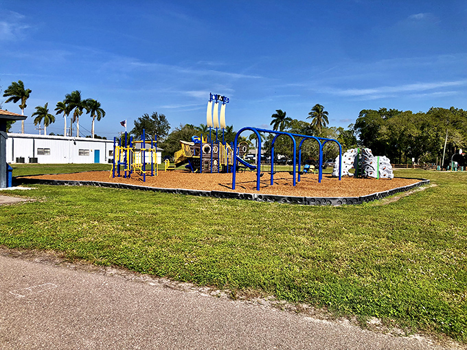 Even the playground in Matlacha comes in coastal colors, where kids burn energy while parents burn with envy over the waterfront real estate.