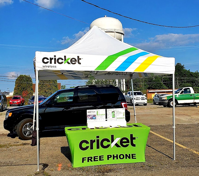 Even technology gets the flea market treatment! Cricket's colorful booth brings modern connectivity to this delightfully analog shopping experience.