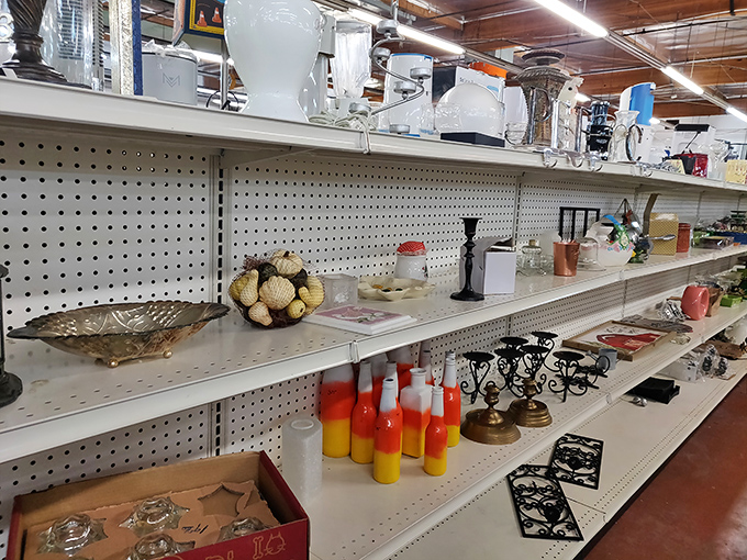 From candy-colored candle holders to elegant vases, these shelves prove one shopper's castoff becomes another's prized mantelpiece decoration.