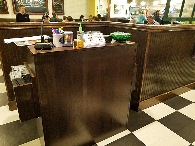 The host station &ndash; first checkpoint on your journey to comfort food nirvana. That bowl of mints isn't just courtesy, it's a promise.