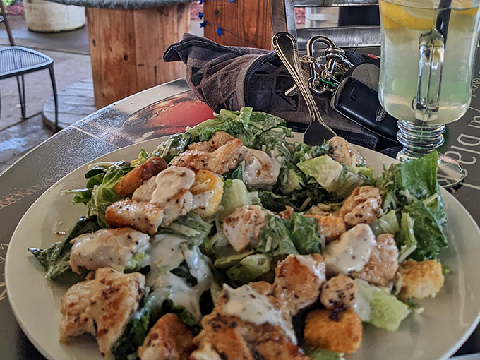 Fresh greens providing the perfect crispy counterpoint to all that glorious fried chicken indulgence.