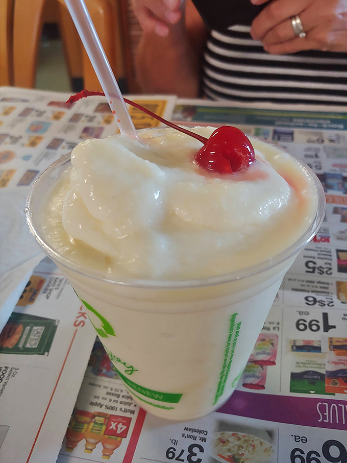 A classic milkshake topped with a cherry &ndash; because some traditions never go out of style, especially the delicious ones.