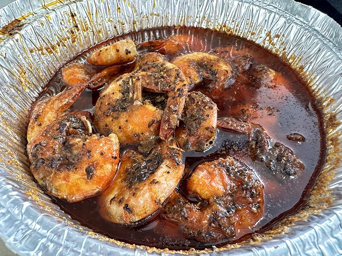 These glistening shrimp swimming in savory sauce aren't just dinner &ndash; they're an invitation to roll up your sleeves and get deliciously messy.