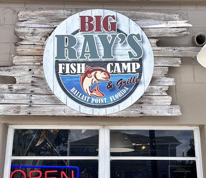 The sign says it all &ndash; this isn't just a restaurant, it's a "Fish Camp & Grille." Part dining experience, part homage to Florida's fishing heritage.