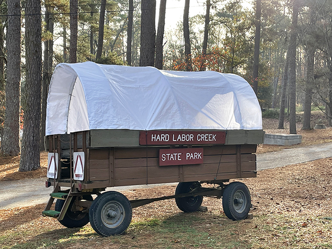 This charming covered wagon sign doesn't just mark Hard Labor Creek&mdash;it time-travels you back to when "hard labor" meant something entirely different from office work.