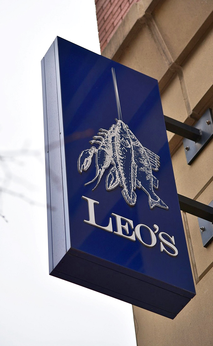 Leo's iconic blue sign with its seafood illustration&mdash;like a North Star for hungry navigators in downtown Grand Rapids.