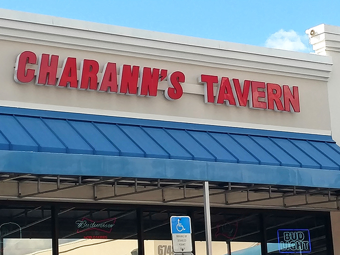 That sign doesn't just spell out a name; it announces a Tampa institution where sandwich dreams come true beneath those signature blue awnings.