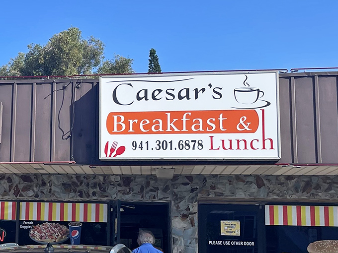 The sign that beckons like a lighthouse to hungry sailors, promising safe harbor from mediocre breakfast in a sea of chain restaurants.