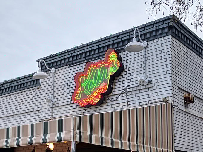 Kelly's iconic neon sign glows like a lighthouse for hungry travelers. That distinctive green and red beacon has guided Norfolk residents to delicious shores for decades.