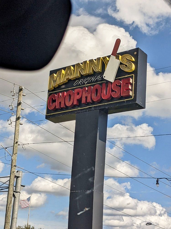 The towering sign announces this chophouse destination with unmistakable roadside charm and character.