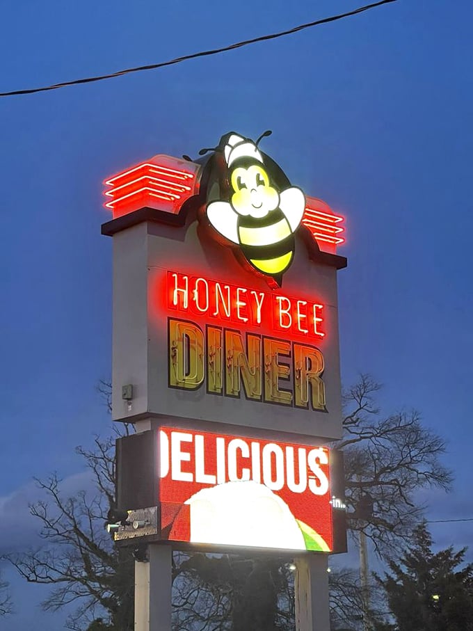As evening falls, that neon sign doesn't just advertise &ndash; it promises a warm welcome and delicious possibilities, no matter what time you arrive.