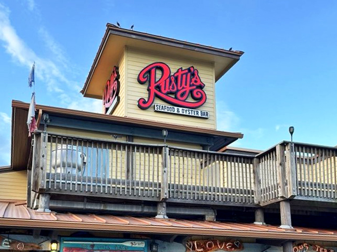 That iconic Rusty's sign against a perfect blue sky &ndash; a beacon for hungry travelers and locals alike. Some landmarks need no introduction.