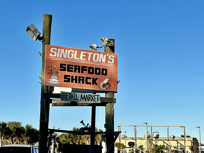 The sign that's guided hungry seafood lovers for generations. Like a lighthouse for your appetite, it promises safe harbor for empty stomachs.