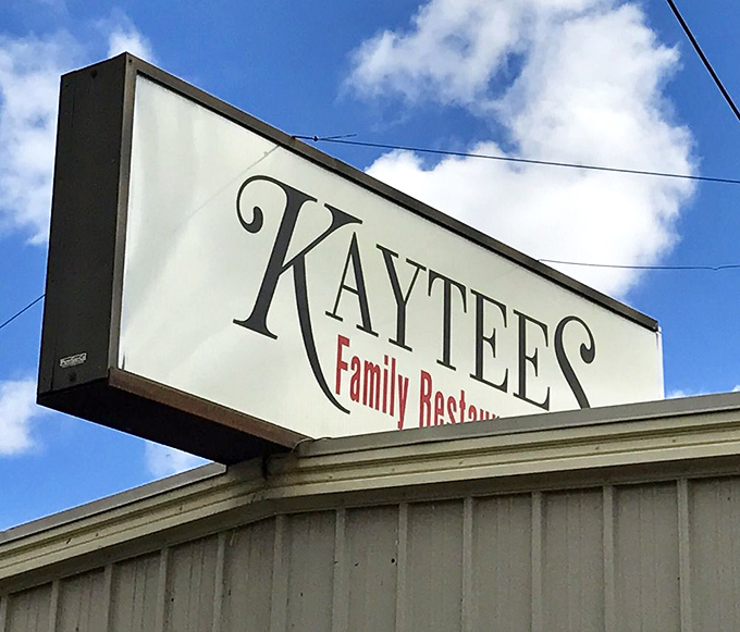 The sign that's guided hungry travelers for years, promising family-style comfort beneath those distinctive cursive letters.