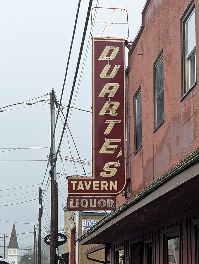 That vintage neon sign has been calling hungry travelers to seafood paradise for more decades than most.