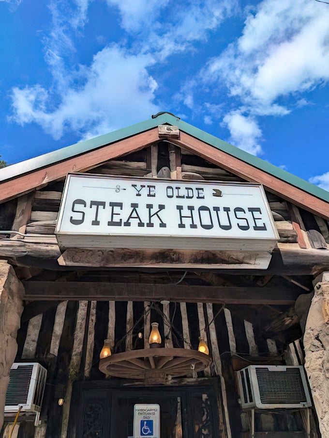 Blue skies frame this iconic sign, as if nature itself is giving its blessing to what might be your best meal in Tennessee.