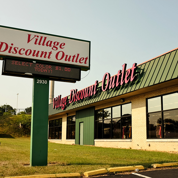The iconic sign announces your arrival at thrifting nirvana. That electronic board below might as well read "Treasure Inside."