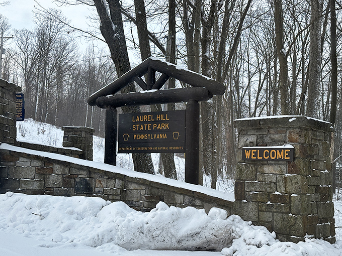 Winter's embrace transforms Laurel Hill into a snow globe come to life. That "WELCOME" sign never felt more inviting against pristine white drifts.