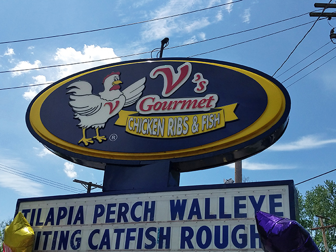 The roadside sign that beckons like a lighthouse to hungry sailors. Follow it to shore and prepare for culinary salvation.