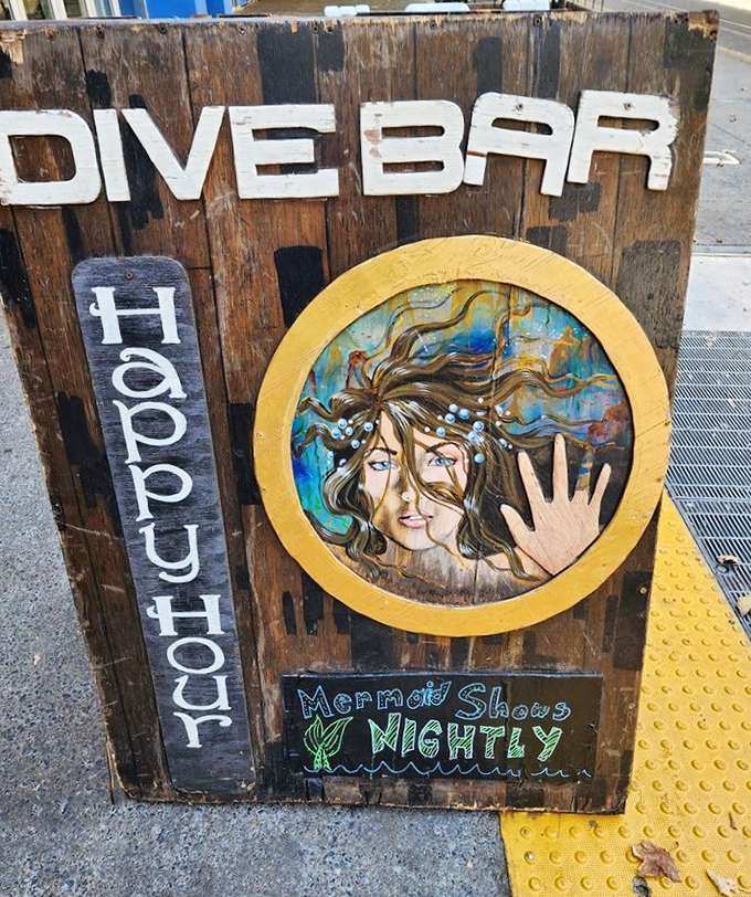 The sidewalk sign promises "Mermaid Shows Nightly" &ndash; perhaps the only truth-in-advertising that exceeds expectations rather than disappoints.