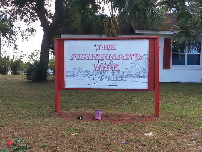 The sign that's guided hungry travelers for years. Like a lighthouse for your appetite, it promises safe harbor for seafood lovers.