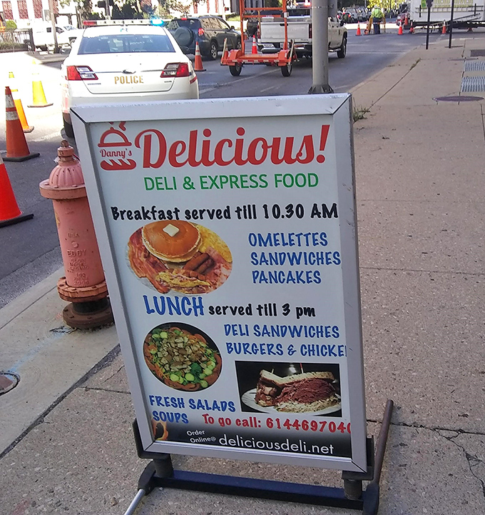 A sidewalk sign that doesn't need to shout&mdash;it simply states the facts about breakfast and lunch with quiet confidence.