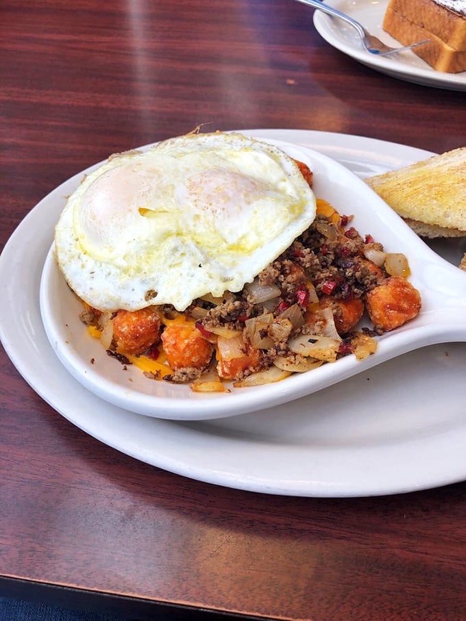 A breakfast skillet that sings with color and texture—topped with that perfect sunny-side-up egg, it's like morning's greatest hits album.