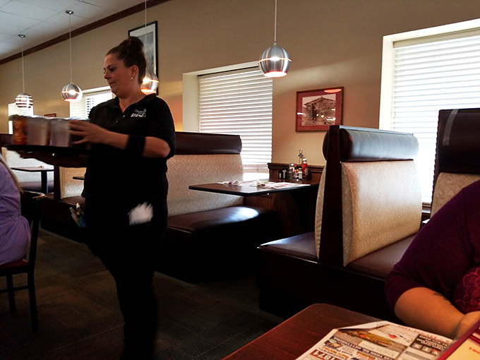 The unsung heroes of diner magic&mdash;servers who balance plates, coffee pots, and your urgent need for more syrup with graceful efficiency.