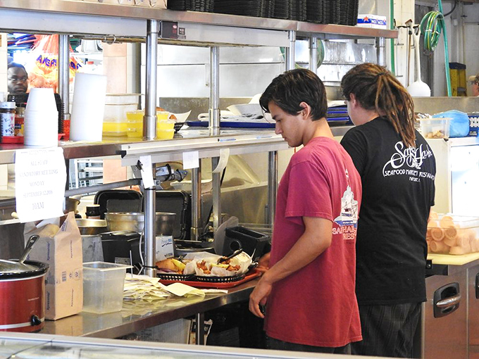 The next generation of seafood specialists learning the craft. In a world of food trends, there's something reassuring about traditions passed down through skilled hands.