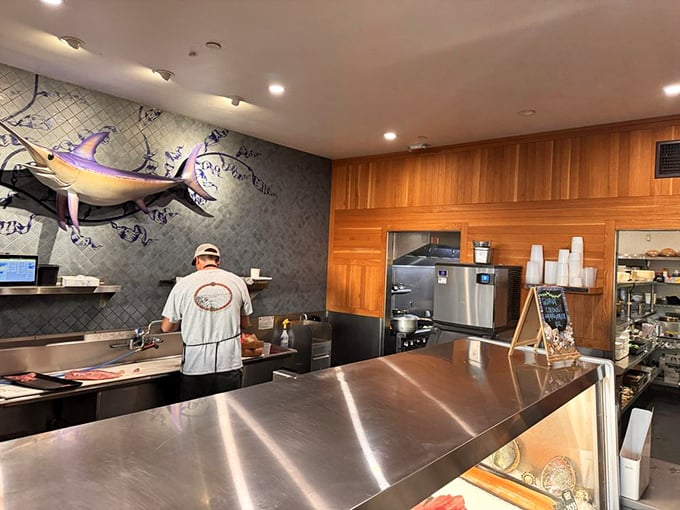 Where the magic begins&mdash;skilled hands transforming the day's catch into culinary masterpieces. This is seafood respect in its purest form.