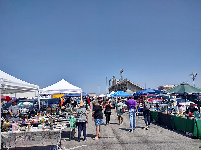 Blue skies frame endless vendor stalls, creating the perfect backdrop for California's ultimate treasure hunting adventure. 