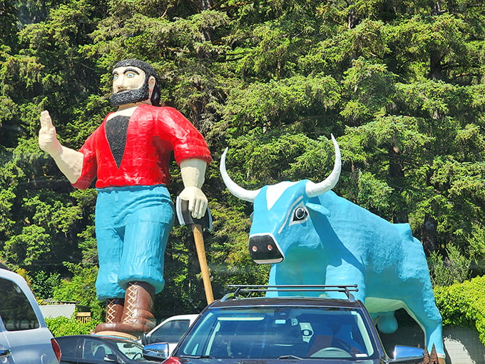 The dynamic duo in all their glory&mdash;Paul forever waving and Babe forever blue, a perfect pairing of American folklore and roadside kitsch.