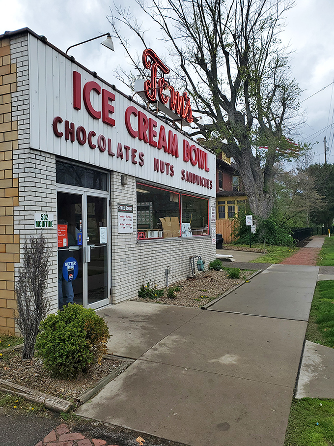 The iconic storefront sign has guided generations of sweet-seekers like a sugary lighthouse on a sea of ordinary desserts.