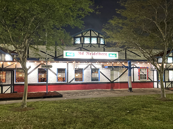 As night falls, Old Heidelberg glows like a Bavarian beacon. The illuminated windows and classic Tudor styling create an irresistible invitation to come inside.