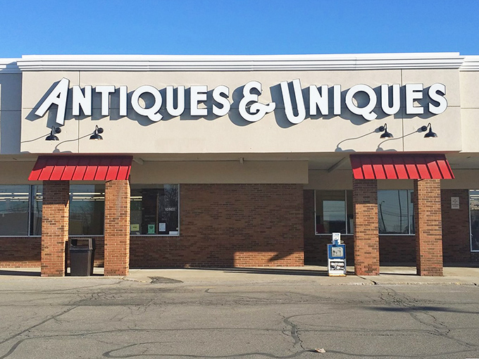 The storefront promises adventures in time travel without the flux capacitor. Those red awnings have sheltered countless shoppers rushing in with empty arms.