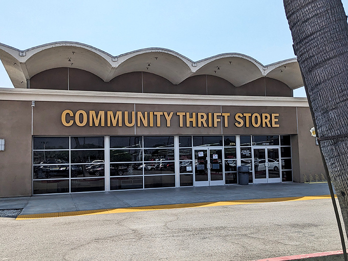 By day, the distinctive wavy roof and desert-toned exterior blend perfectly with the Southern California landscape&mdash;a temple of thrift under palm tree sentinels.