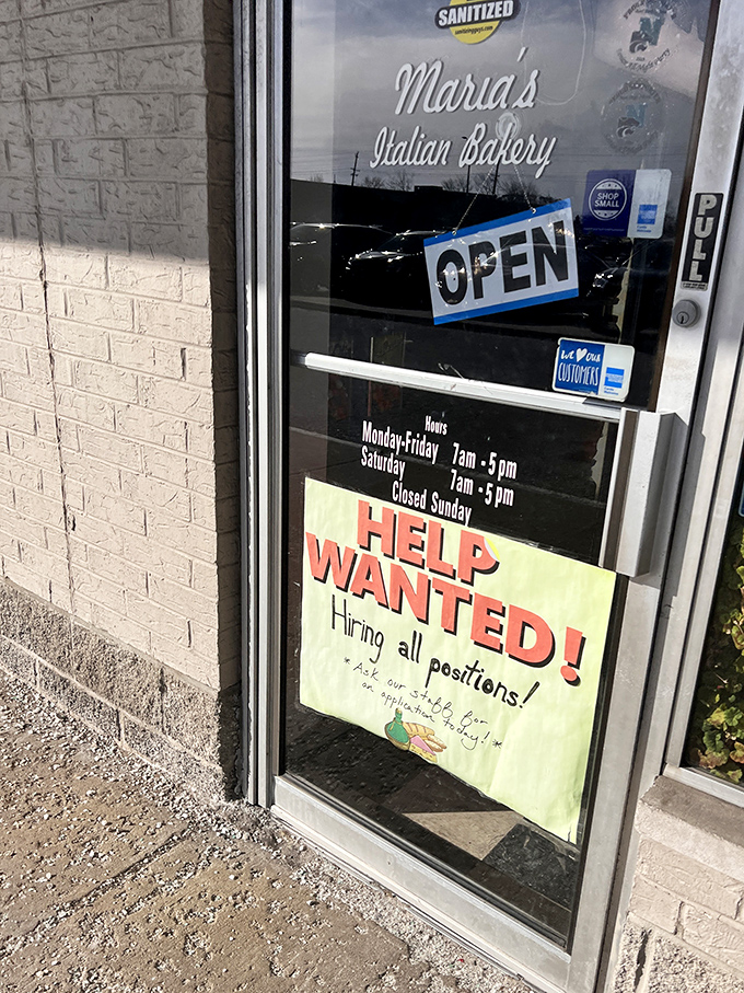 "HELP WANTED" because making food this good requires reinforcements. The "OPEN" sign might as well say "PARADISE FOUND" for Italian food lovers.