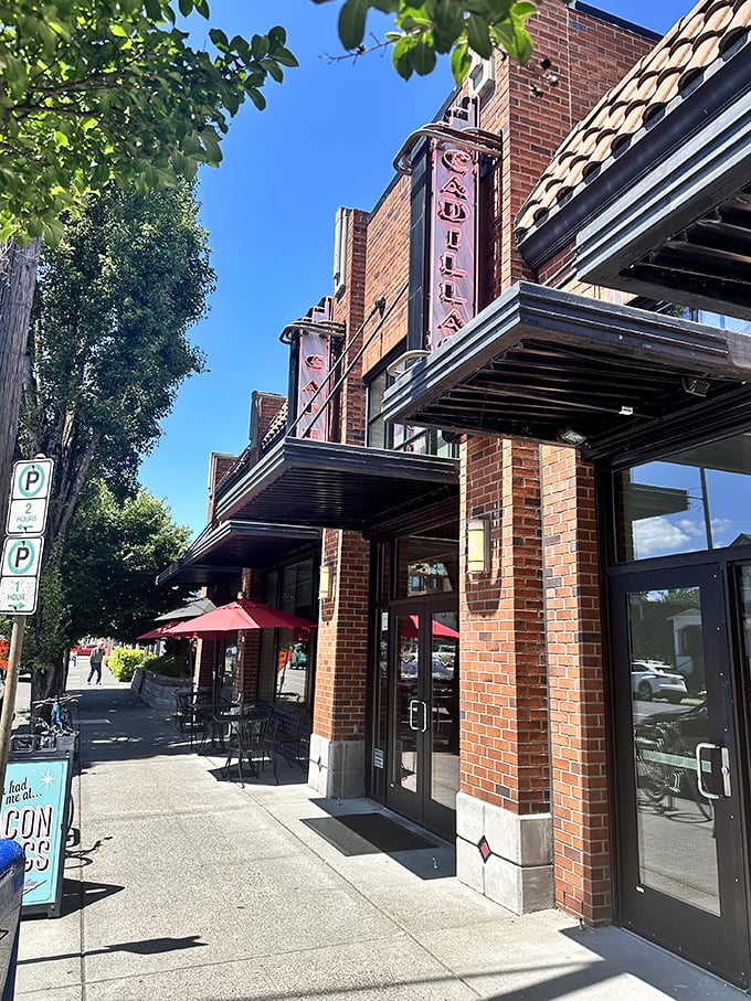 The iconic Cadillac sign stands as a beacon for breakfast seekers, promising automotive-themed delights for your taste buds.