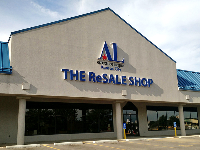 The Assistance League of Kansas City proudly announces its retail masterpiece. This isn't just a store sign&mdash;it's a beacon for bargain seekers.