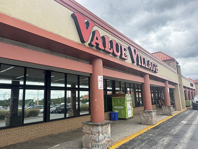 Value Village stands sentinel against cloudy skies, a cathedral of secondhand treasures where one person's past becomes another's future.